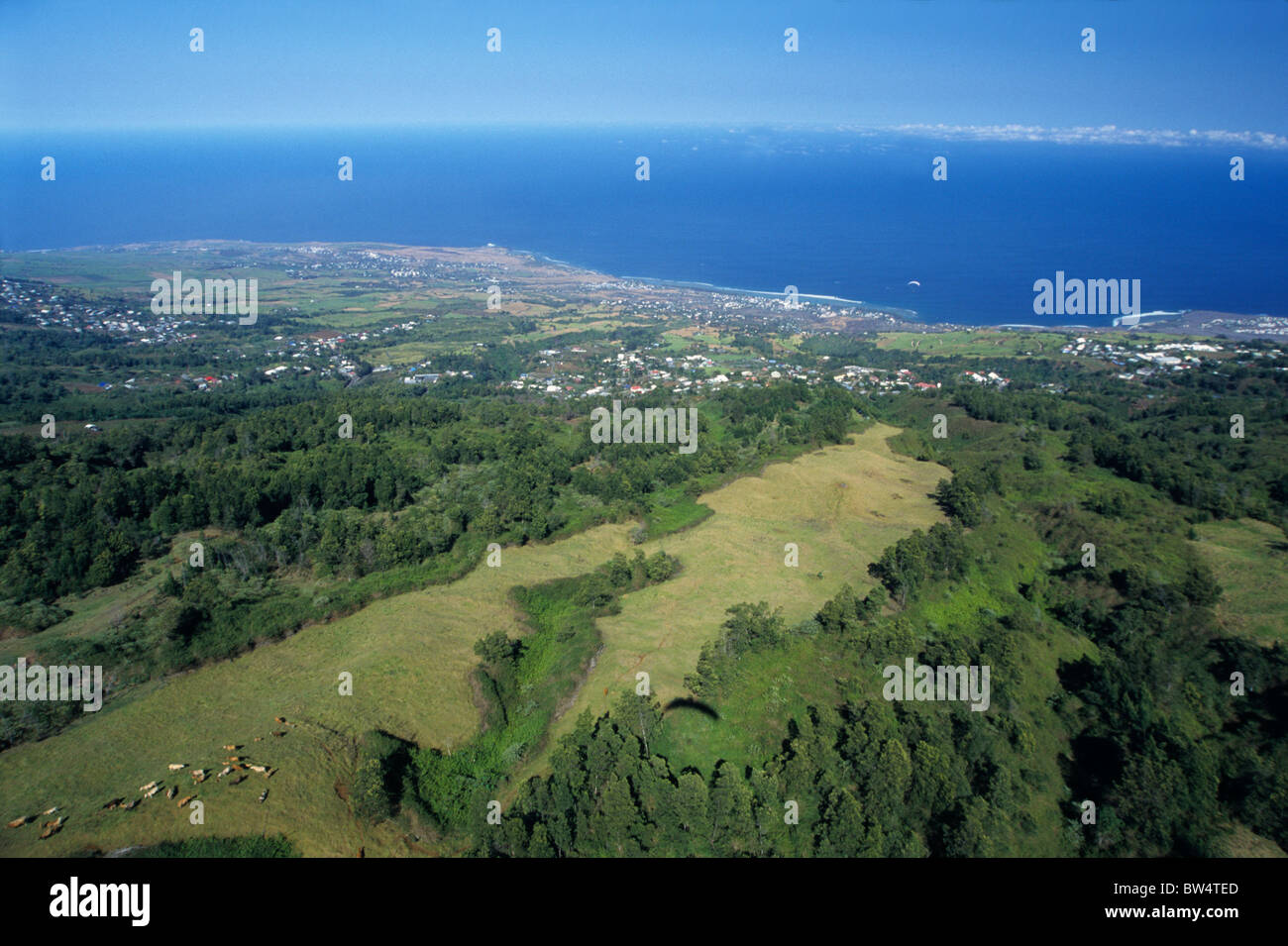 Aerial view of fields over Saint Leu town and coast , Reunion Island ...