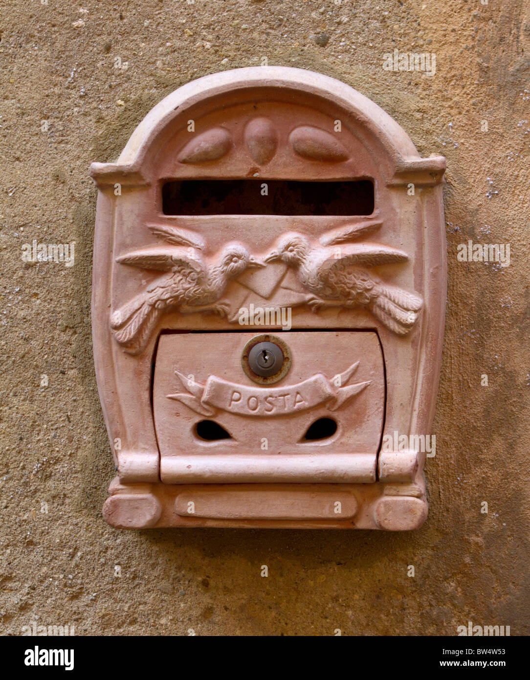 Terra-cotta letterbox in Italy Stock Photo - Alamy