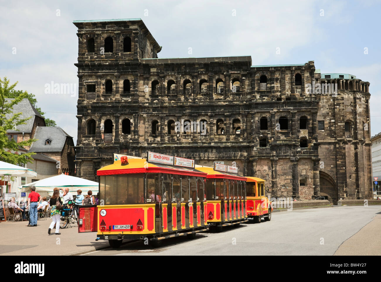 Tourist train by the Porta Nigra (Roman city gate). Trier, Rhineland ...