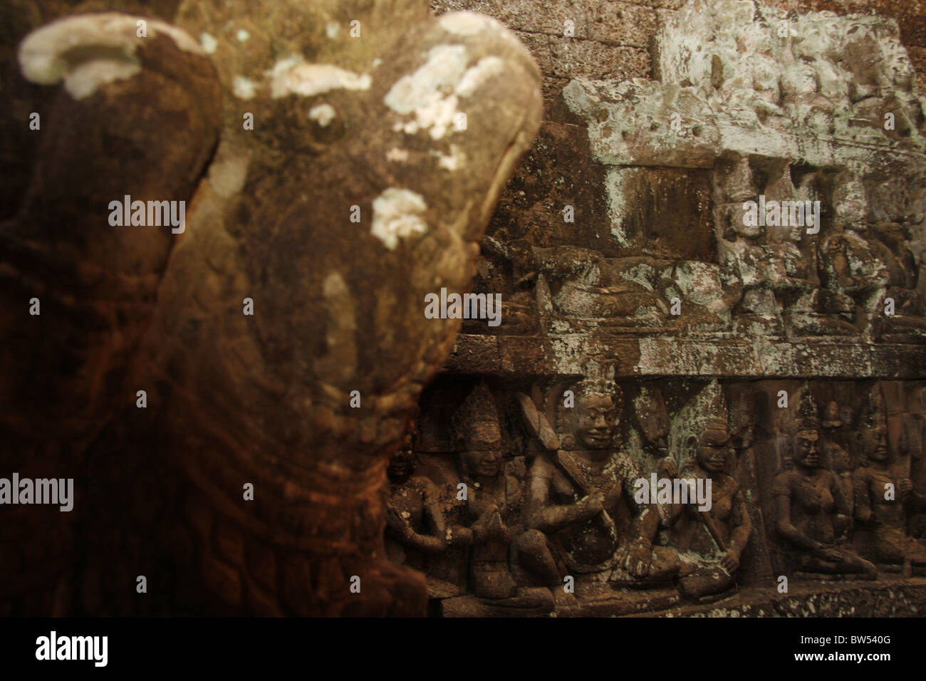 Reliefs inside the corridor of the Terrace of the Leper King in Angkor ...
