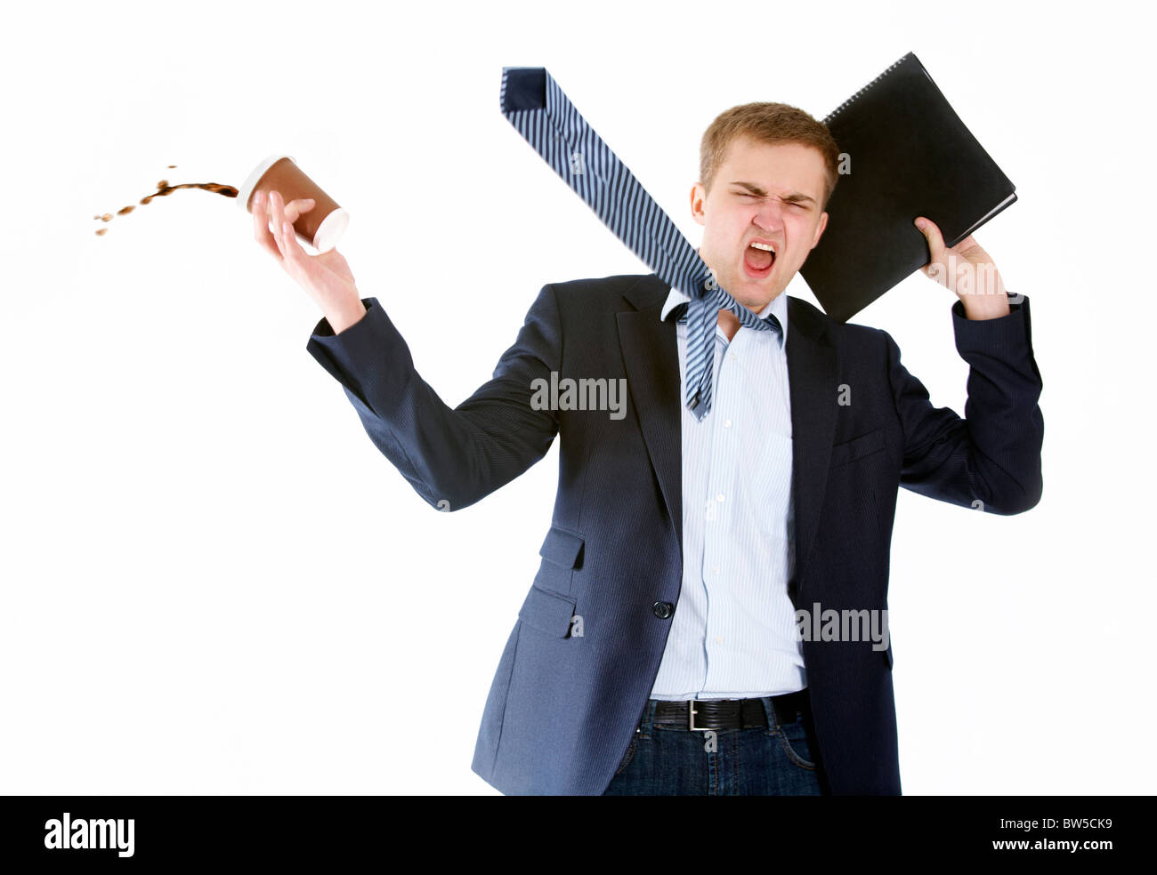 Portrait of young businessman showing disgust after tasting coffee ...