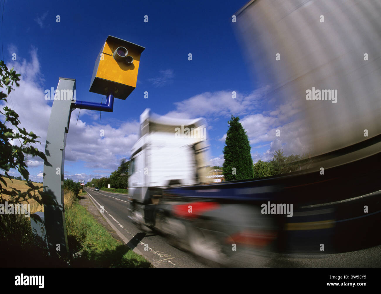 articulated lorry passing speed camera on roadside near leeds yorkshire ...