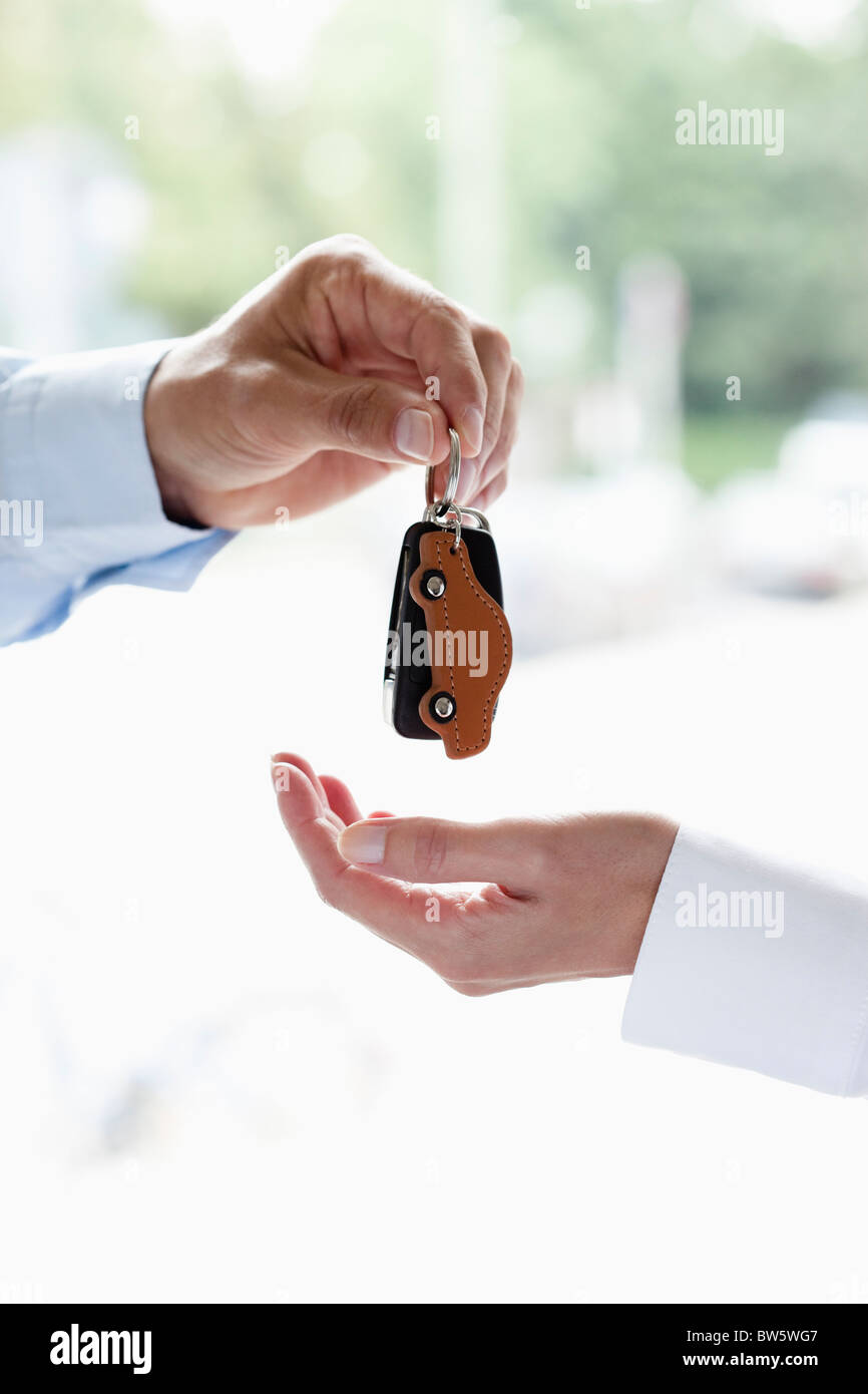 Handing over car key hi-res stock photography and images - Alamy