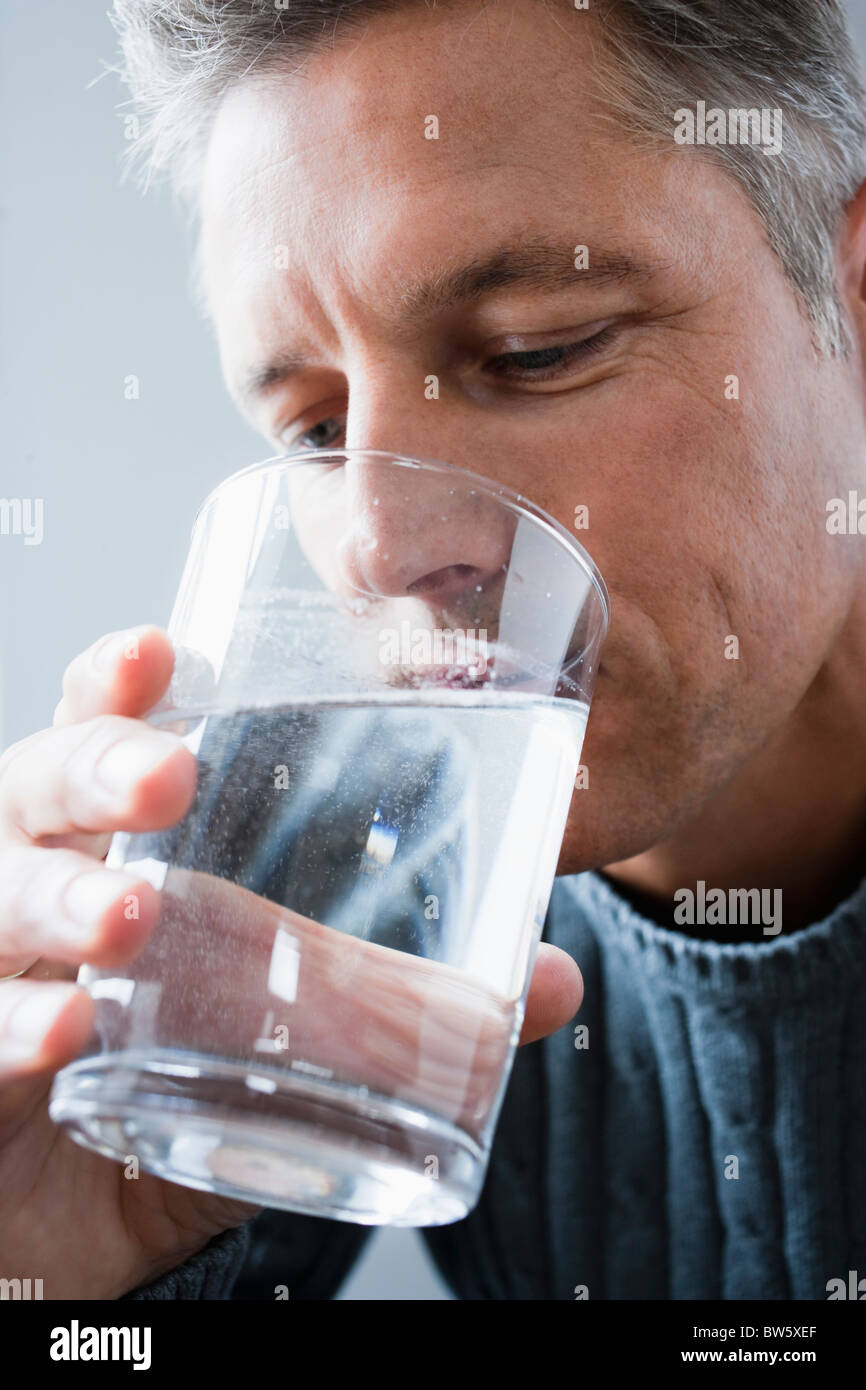 Drinking medicine hi-res stock photography and images - Alamy