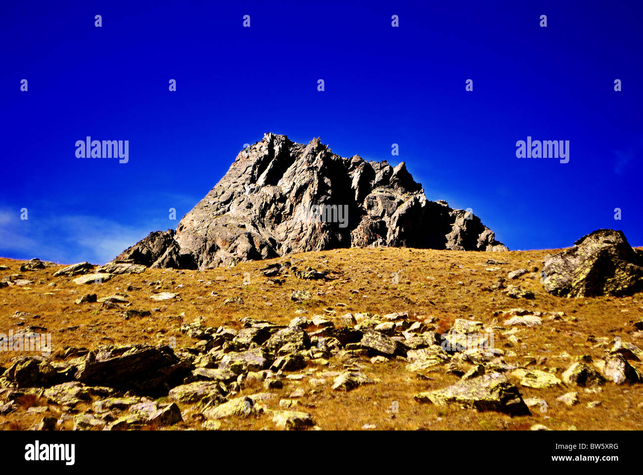 mountains without vegetation and blue sky background Stock Photo - Alamy