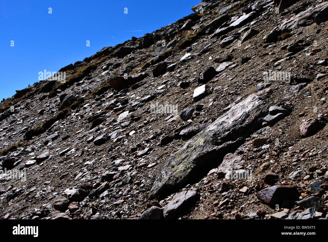 mountains without vegetation and blue sky background Stock Photo - Alamy