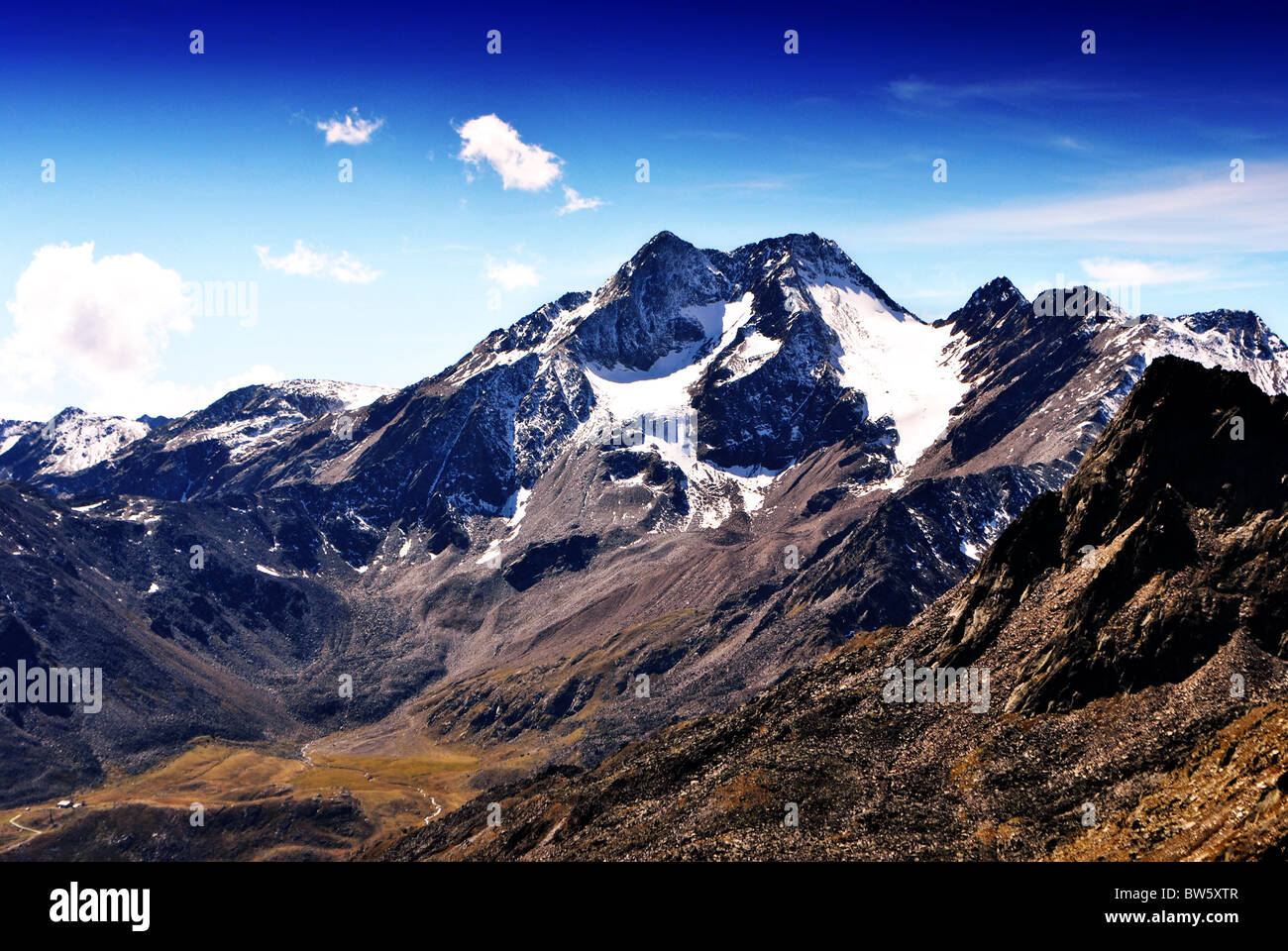 mountains without vegetation and blue sky background Stock Photo - Alamy