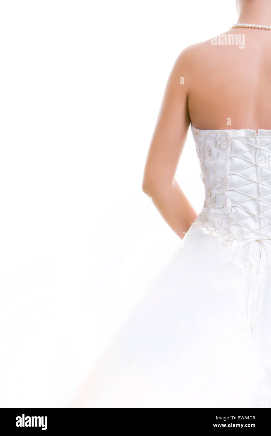 Image of back of bride in wedding dress isolated on a white background ...