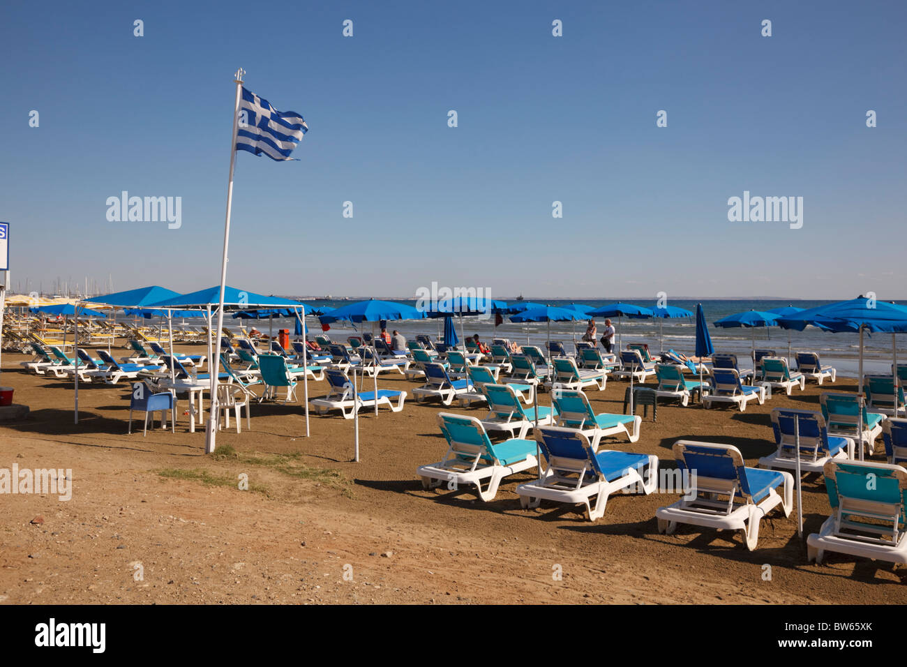 Deckchairs on Larnaca seafront Finikoudes beach. Cyprus Stock Photo - Alamy