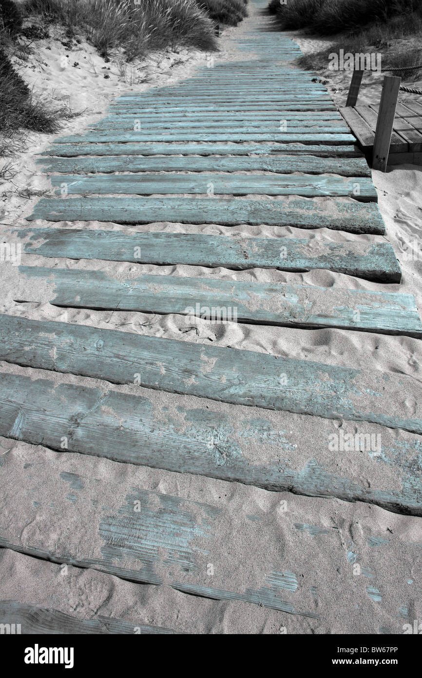A winding wooden plank path on the beach in Portugal Stock Photo - Alamy