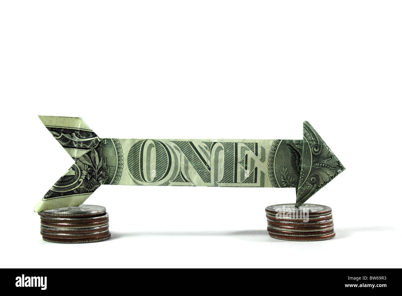 arrow made of usd currency. Shows one way direction Stock Photo - Alamy