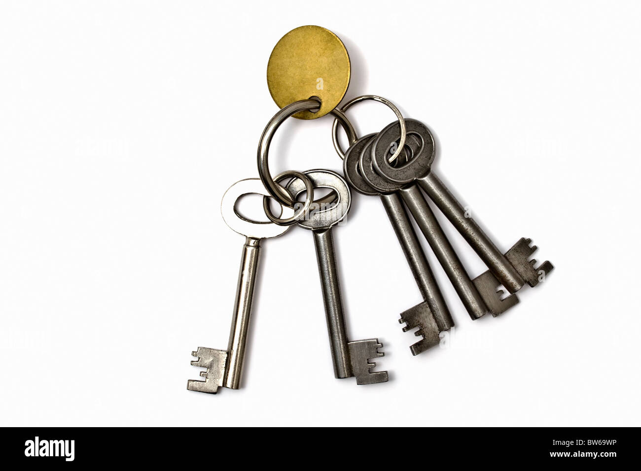 A bunch of old keys isolated on white background Stock Photo - Alamy