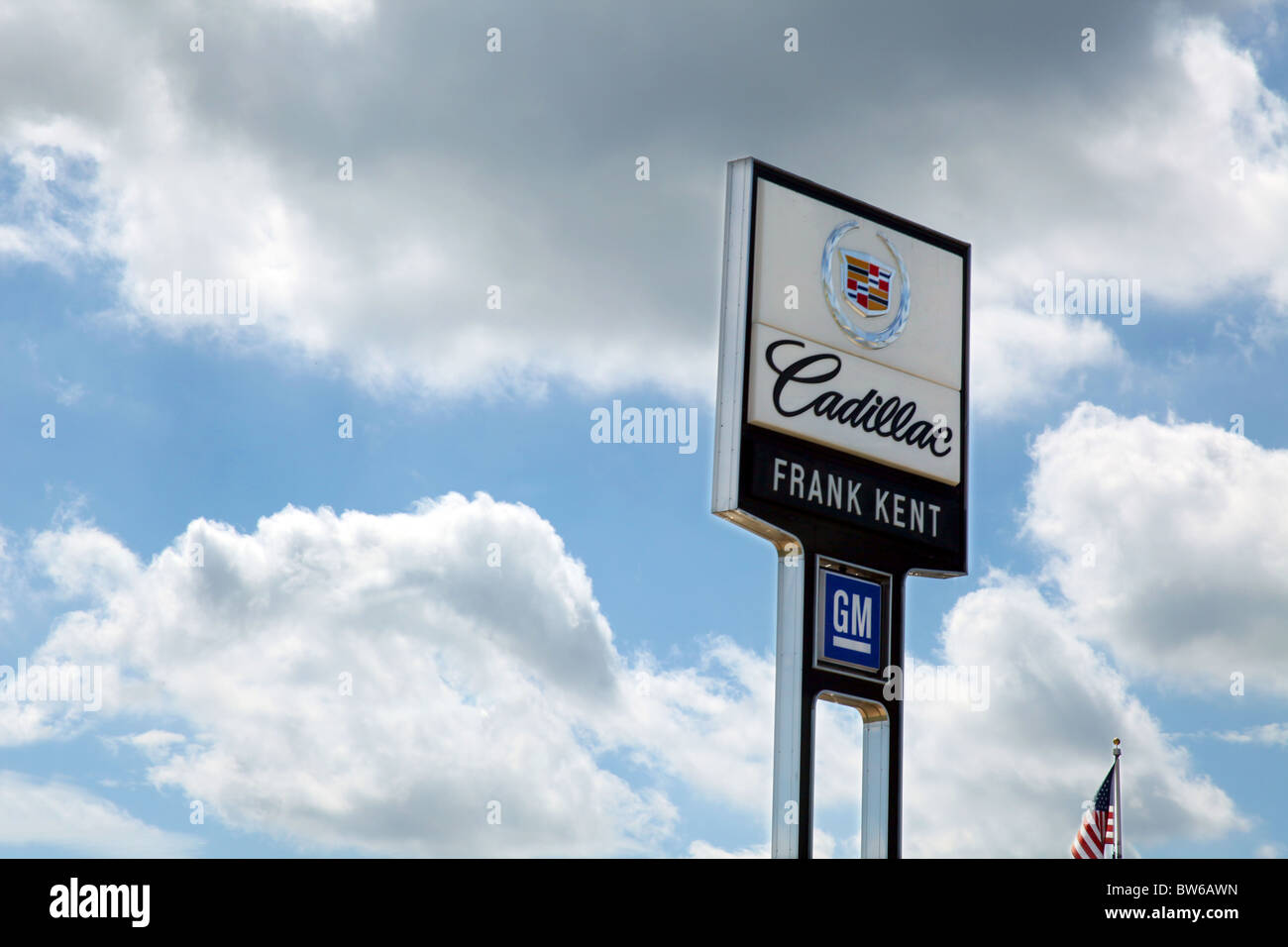 Cadillac sign against a blue sky and white clouds Stock Photo - Alamy