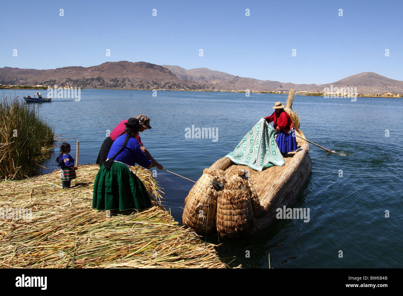 Totora reed boat mooring, on the floating Uros islands, Lake Titicaca ...