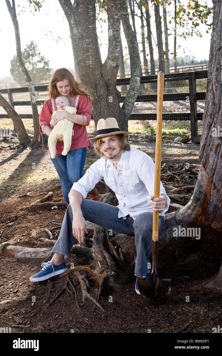 Outdoors resting under tree on family ranch Stock Photo - Alamy