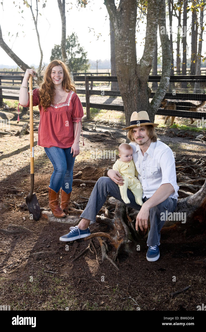 Outdoors resting under tree on family ranch Stock Photo - Alamy