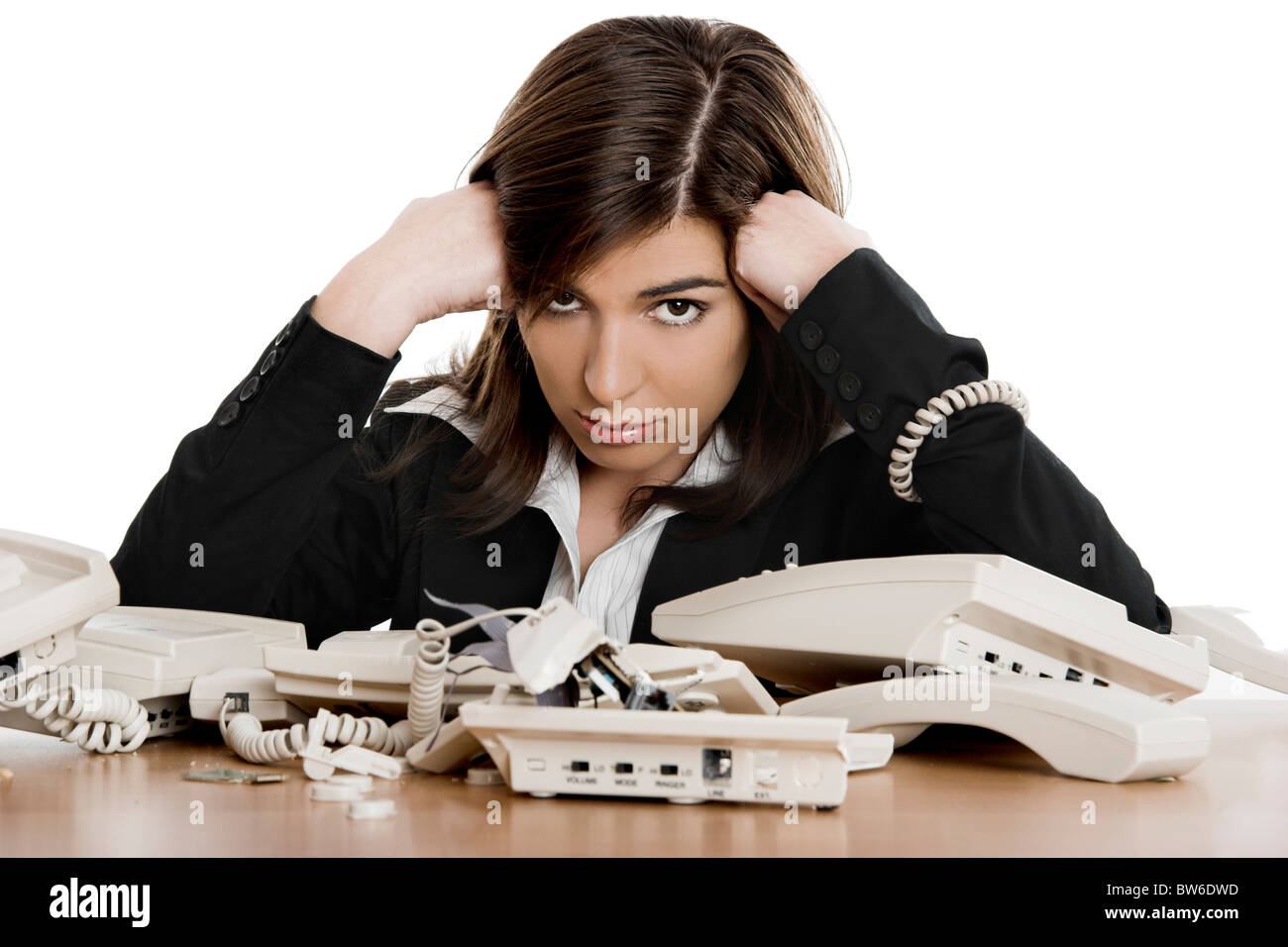 Busy woman working and answering a lot of calls at the same time Stock ...