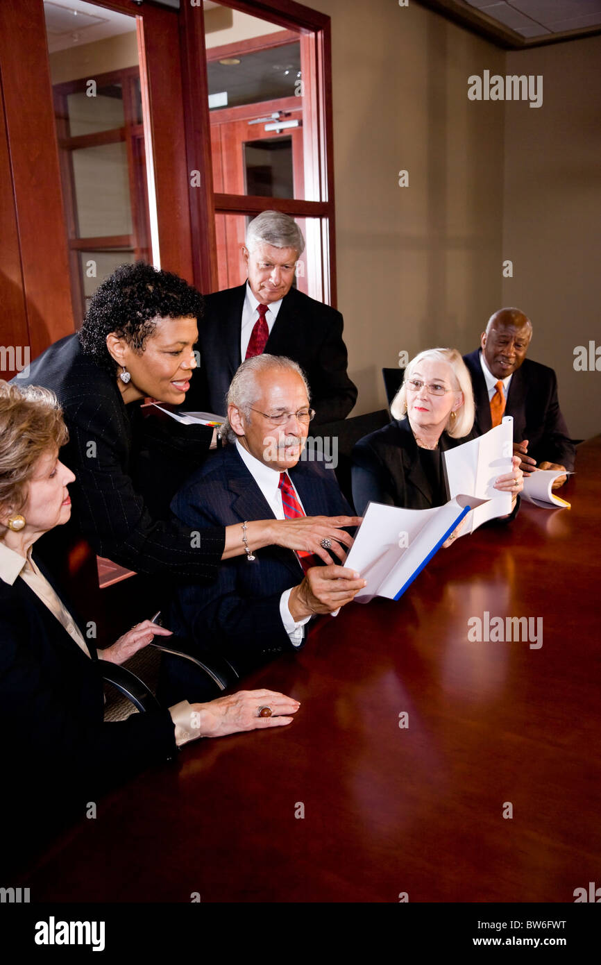 Managers reviewing reports hi-res stock photography and images - Alamy