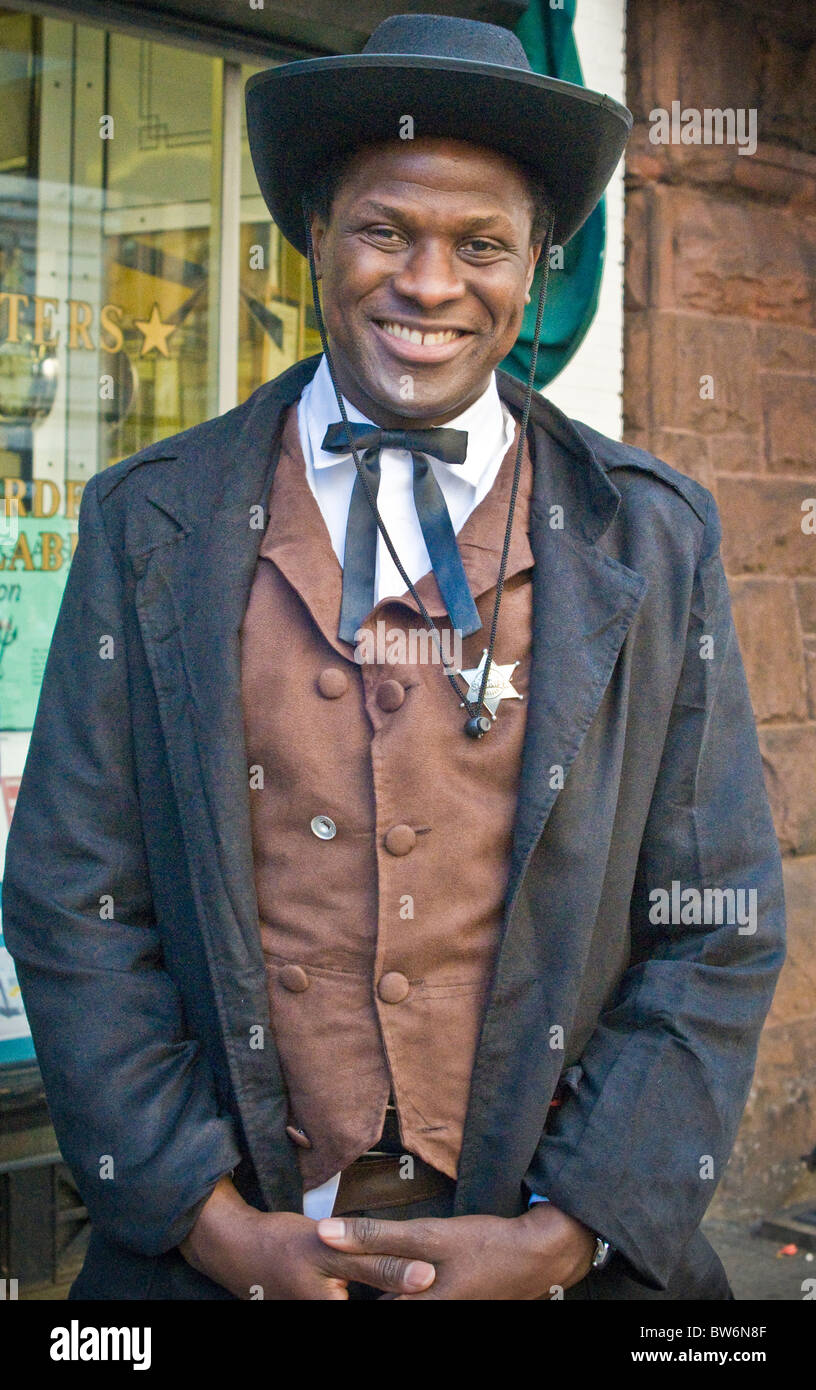 One young tall smiling African American dressed in cowboy outfit Stock ...