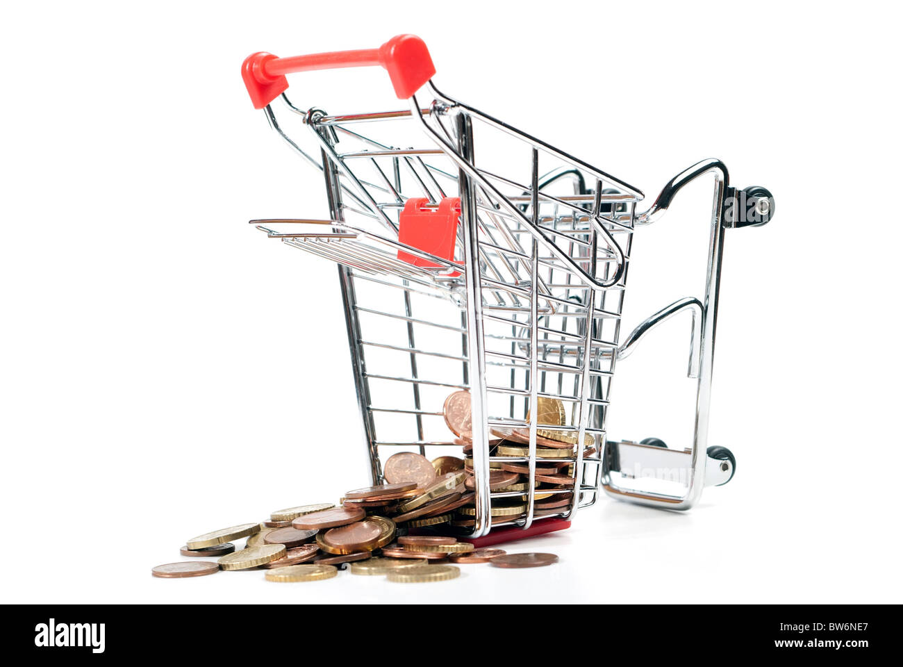 shopping cart with coins isolated on white background Stock Photo - Alamy