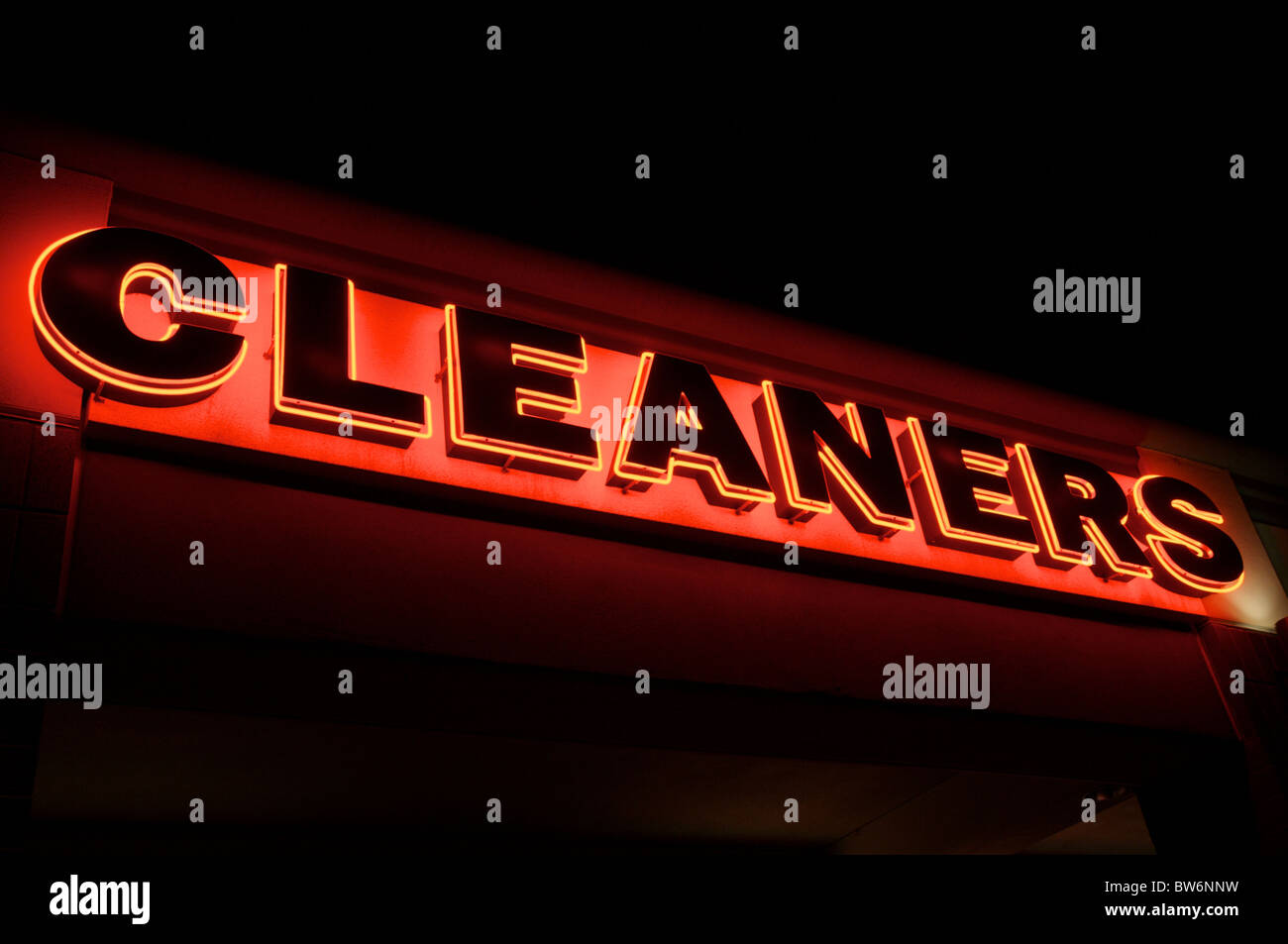 A neon "cleaners sign Stock Photo - Alamy