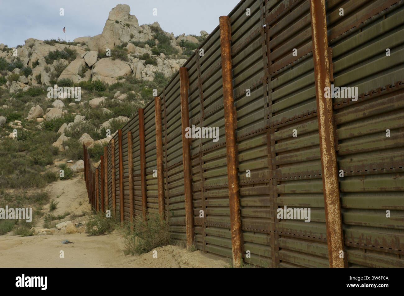 A section of the US border fence with Mexico is incomplete as it ...