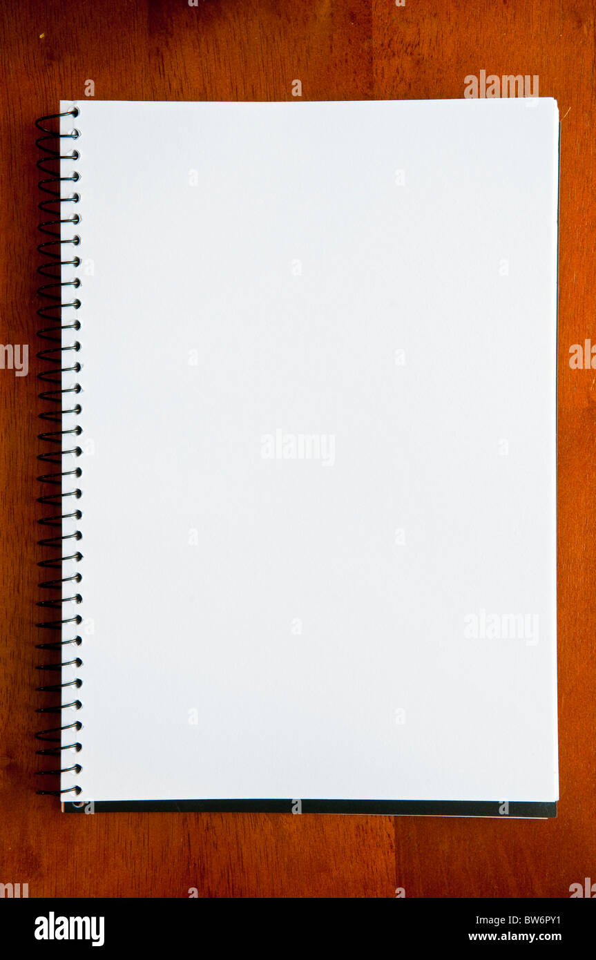 A large spiral bound notebook with blank pages Stock Photo - Alamy