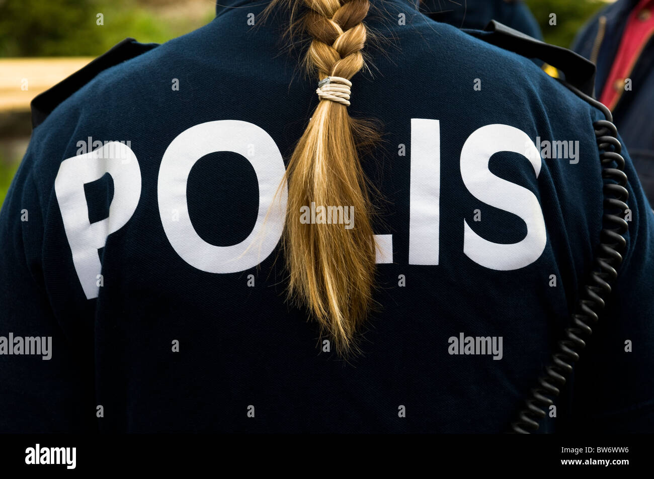 Female police with braid Stock Photo - Alamy