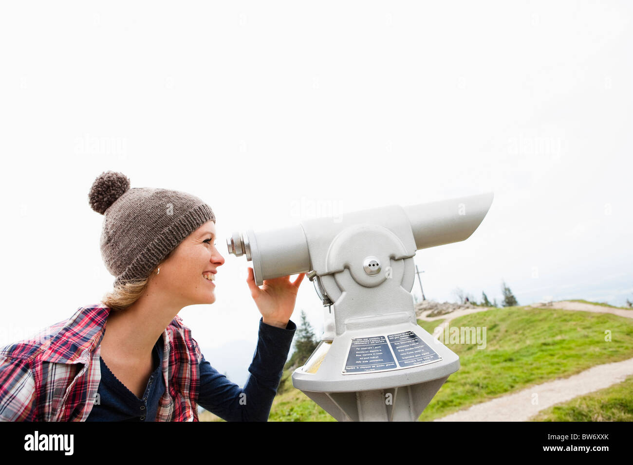 Woman using telescope hi-res stock photography and images - Alamy