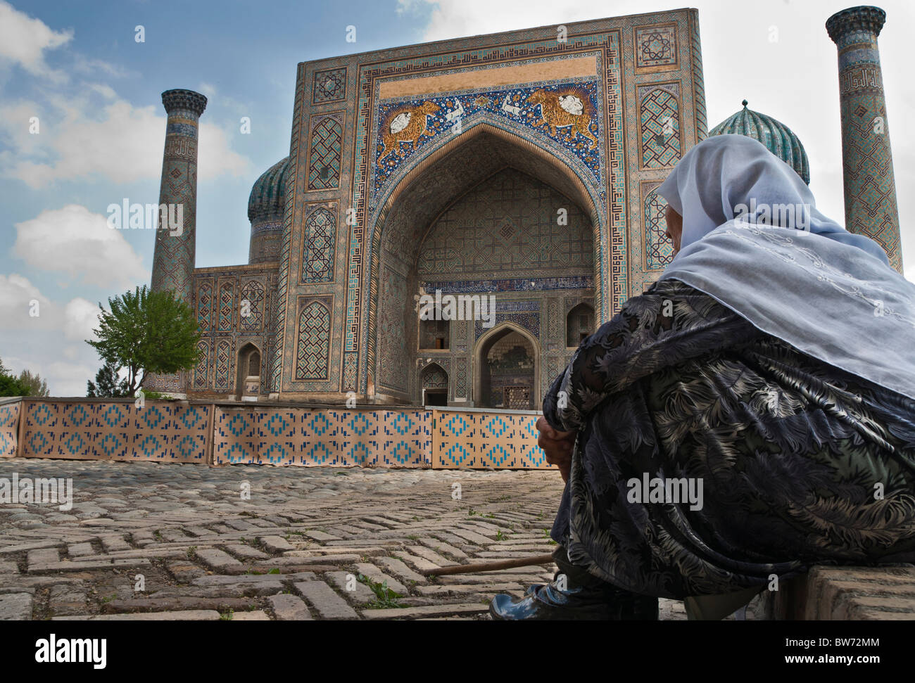 Woman in front of the Registan, Samarcand, Uzbekistan, Asia Stock Photo ...