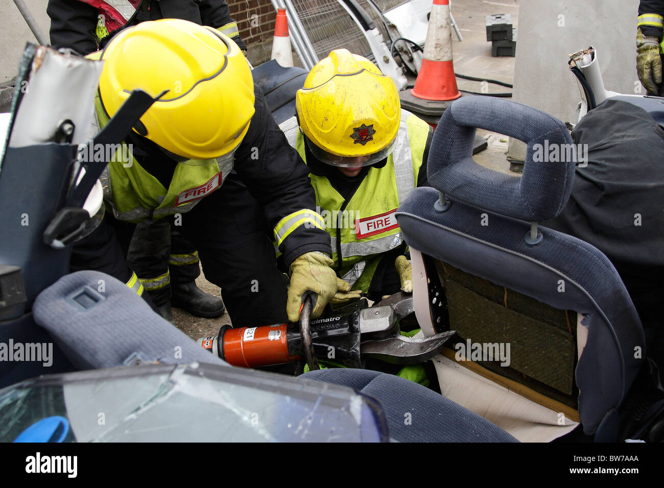 Firefighters using Holmatro rescue tools Stock Photo - Alamy