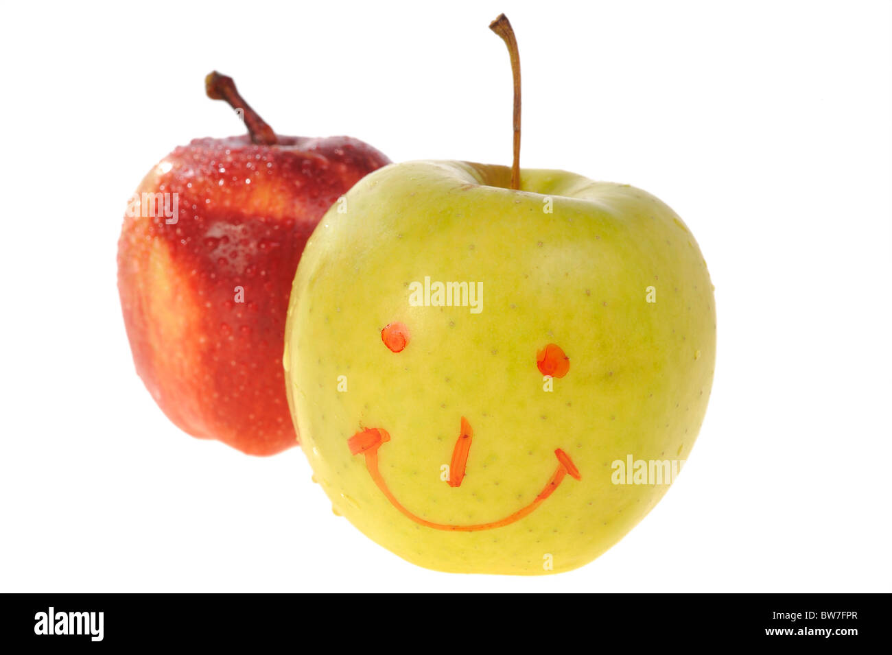 apples with a smile on a white background Stock Photo - Alamy