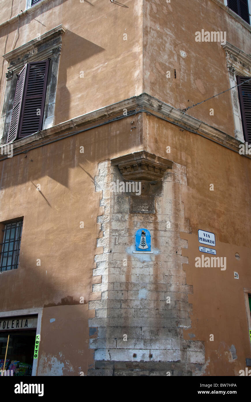 Corner Shrine in Jesi with a symbol of the black madonna of Loreto in ...