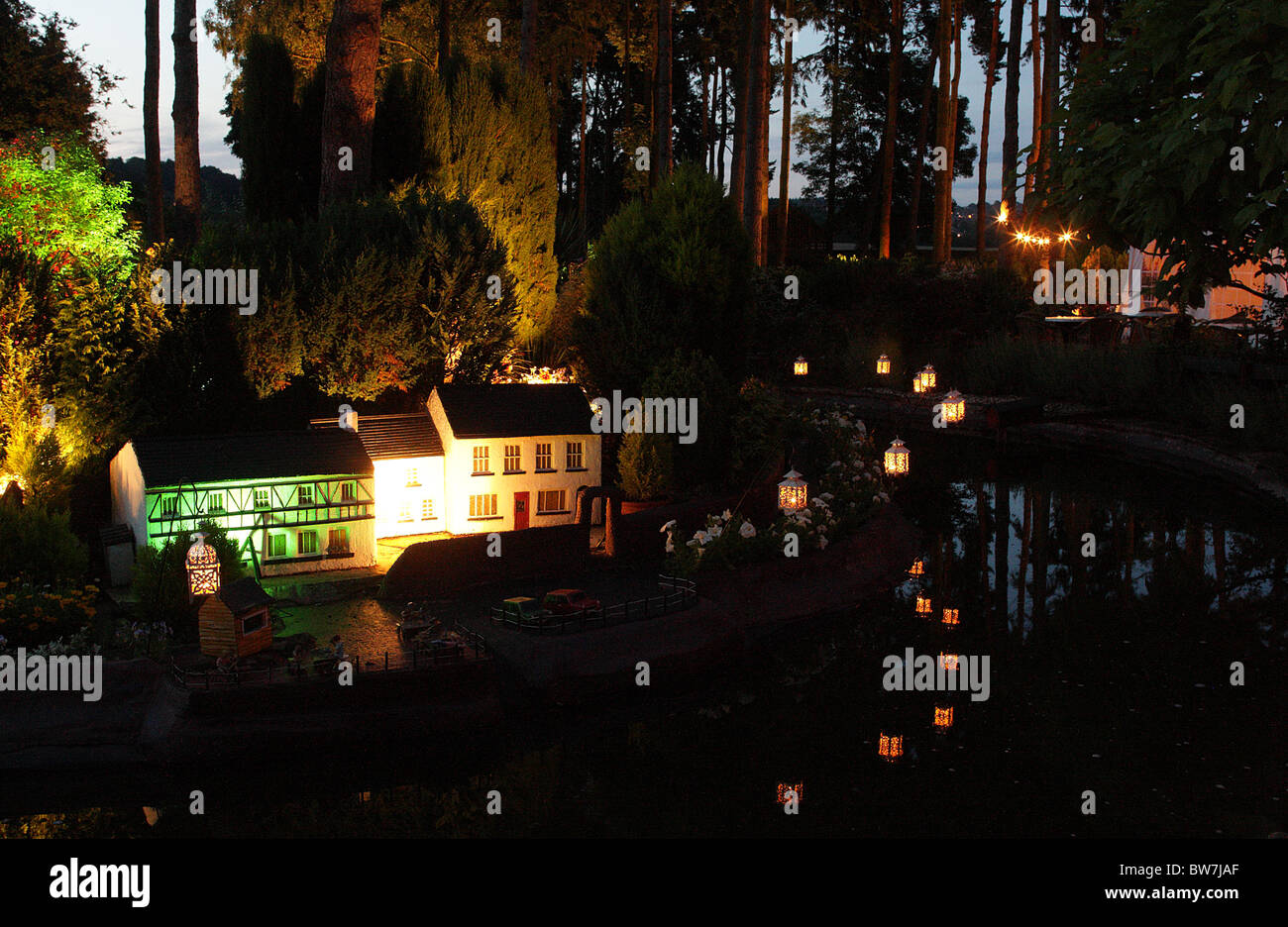 Model village lit up at night. Pond lights Stock Photo - Alamy