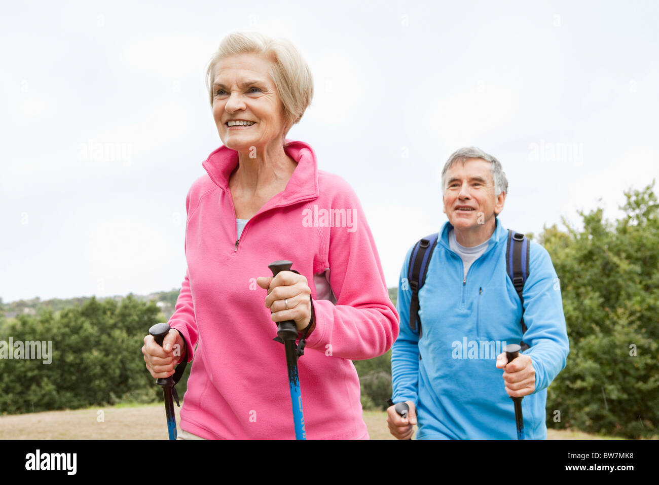 Mature couple doing nordic walking hi-res stock photography and images ... Mature couple doing nordic walking hi-res stock photography and images ...