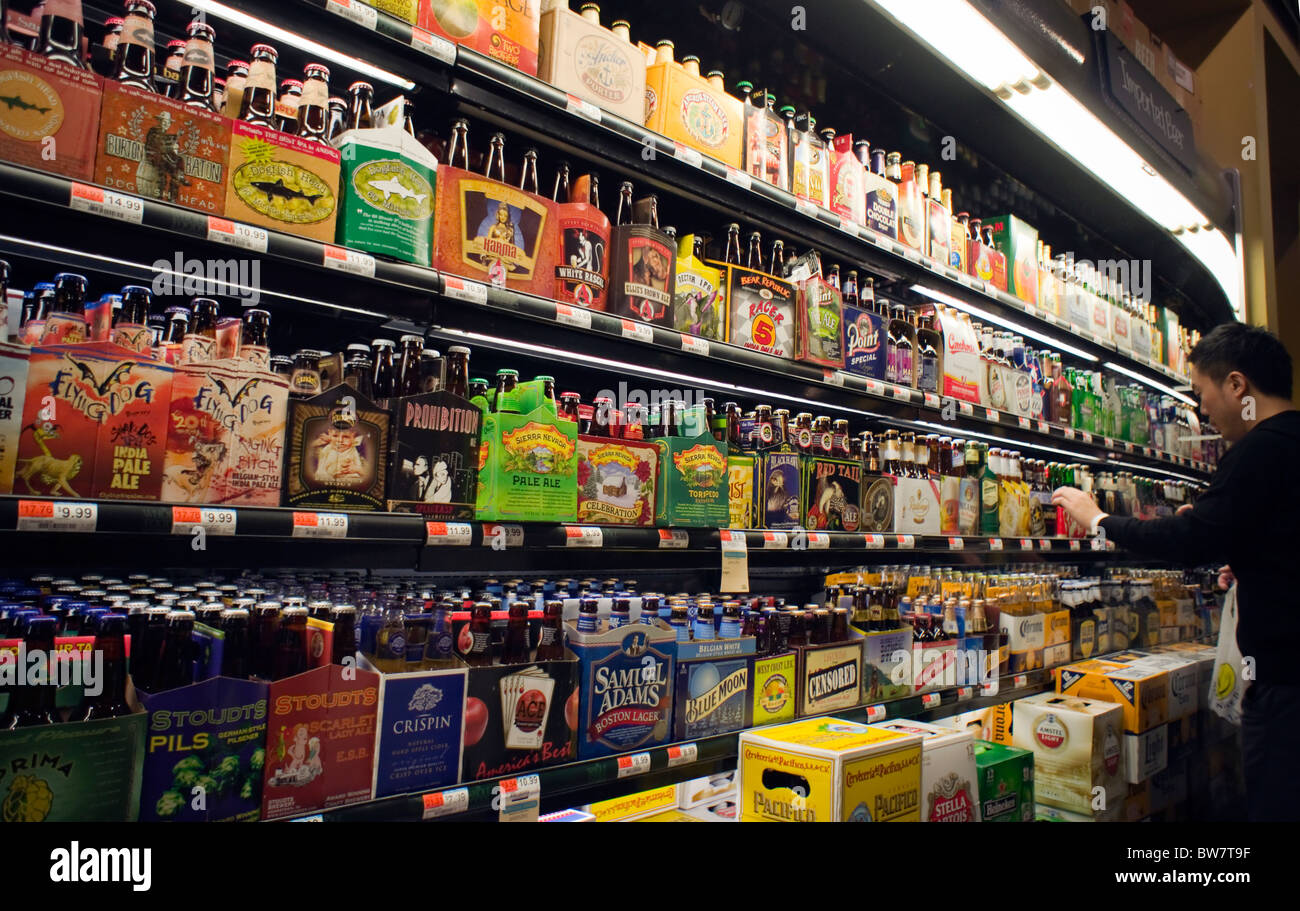 A supermarket beer department displaying craft and artisanal beers ...