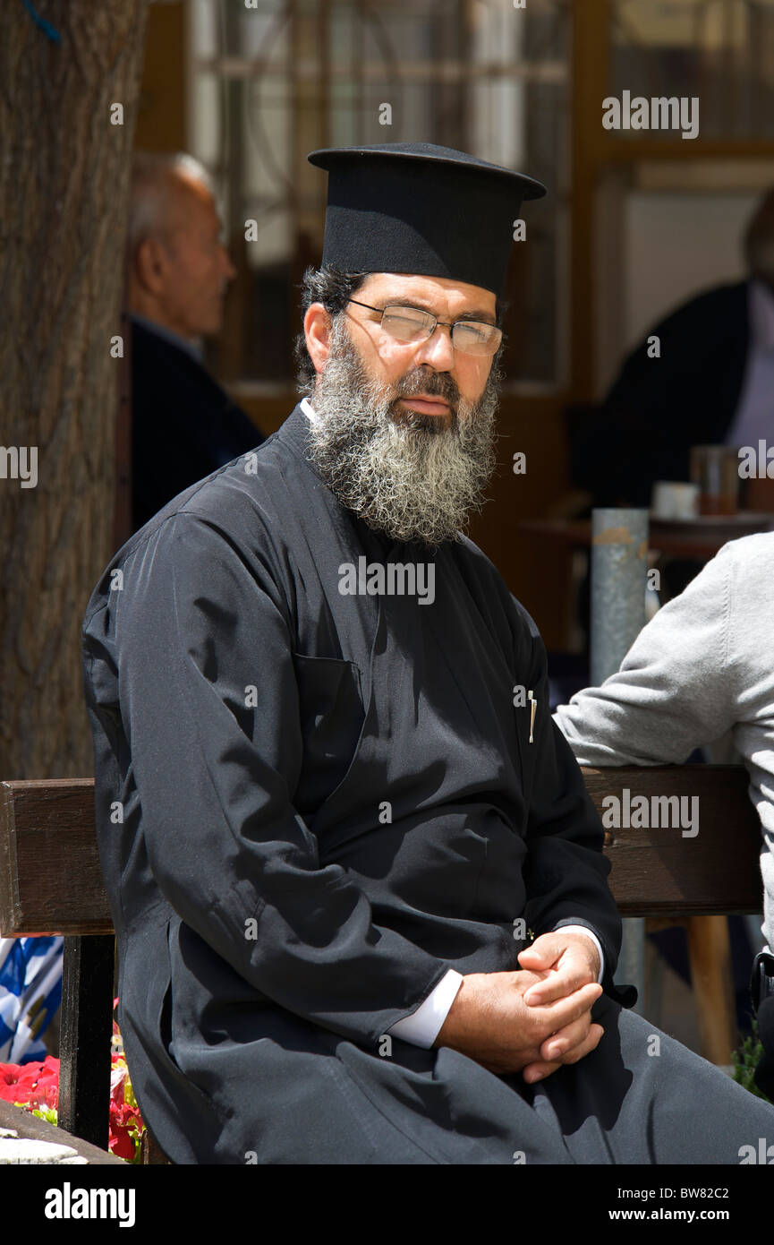 Monk sitting hi-res stock photography and images - Alamy