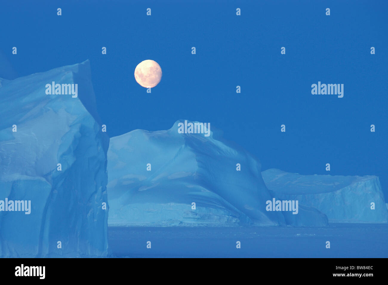 Moon (almost full) rising over antarctic landscape, Antarctica Stock ...