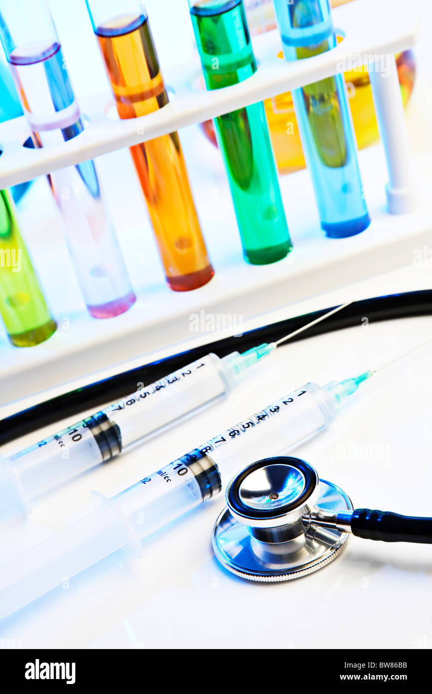 Stethoscope, syringes, and test tubes Stock Photo - Alamy