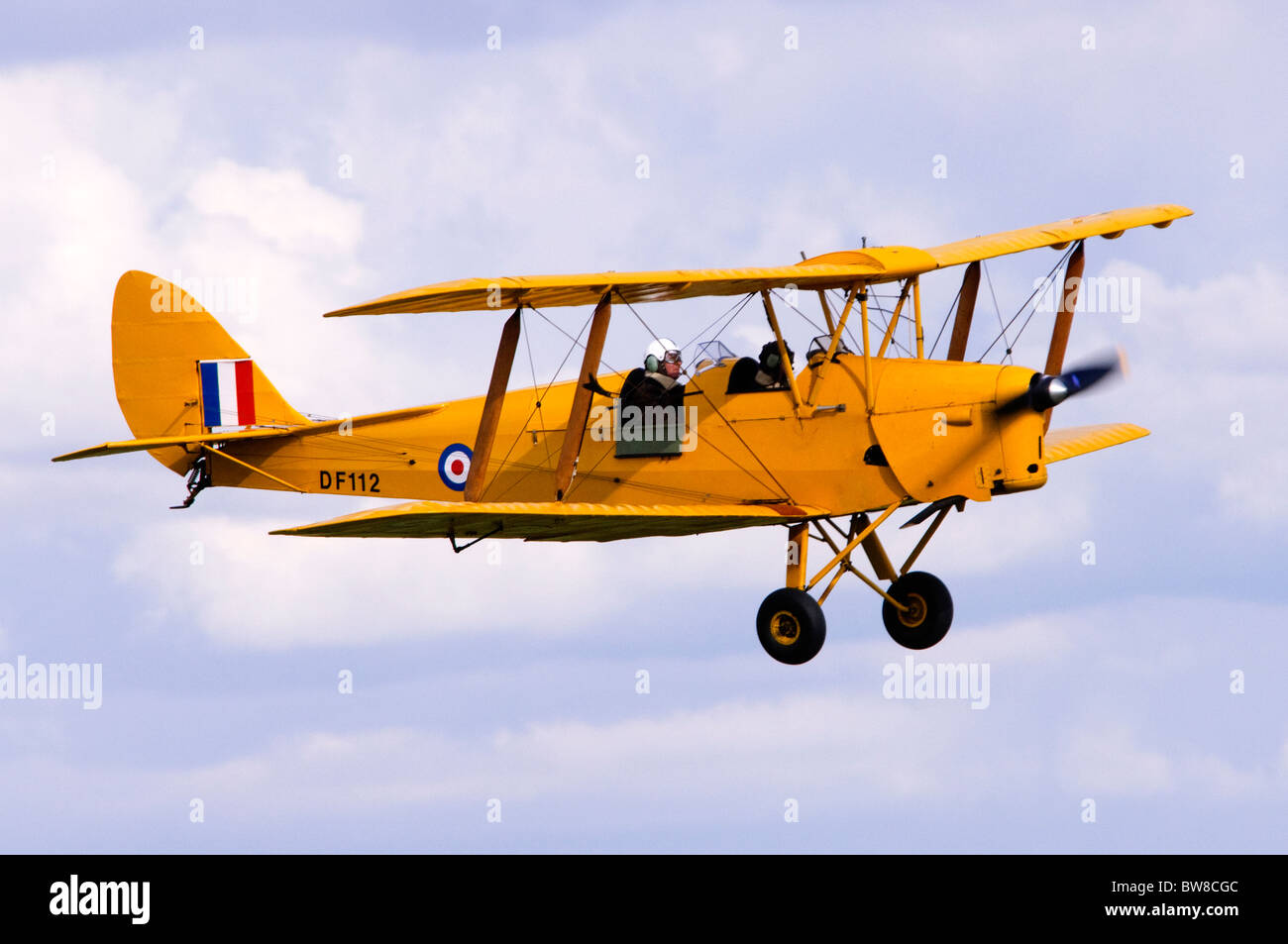 De Havilland DH.82A Tiger Moth aircraft in RAF trainer colours makes a ...