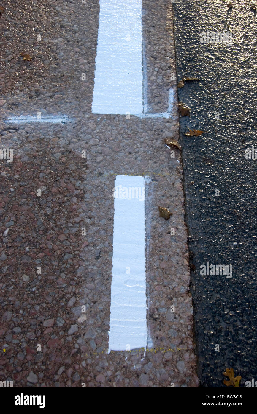 Thick and thin road marking white lines Stock Photo - Alamy