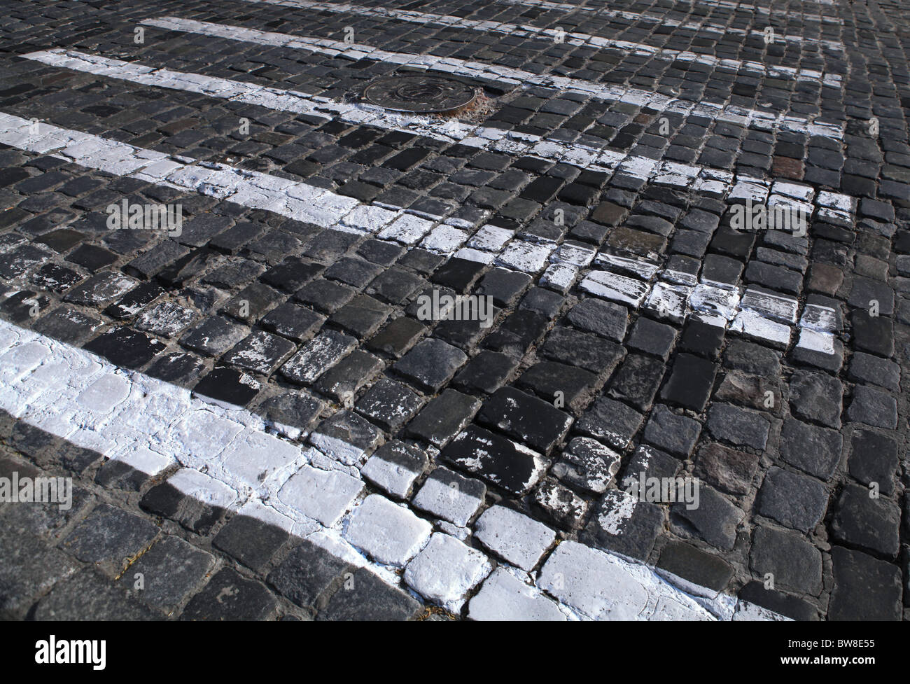 paving stones texture with painted white pedestrian crossing Stock ...