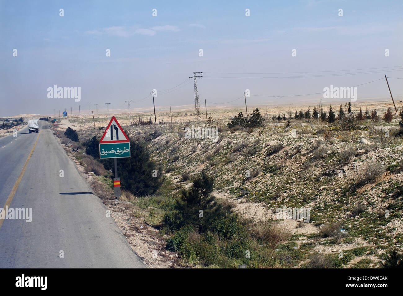 Road sign on desert road in Syria Stock Photo - Alamy