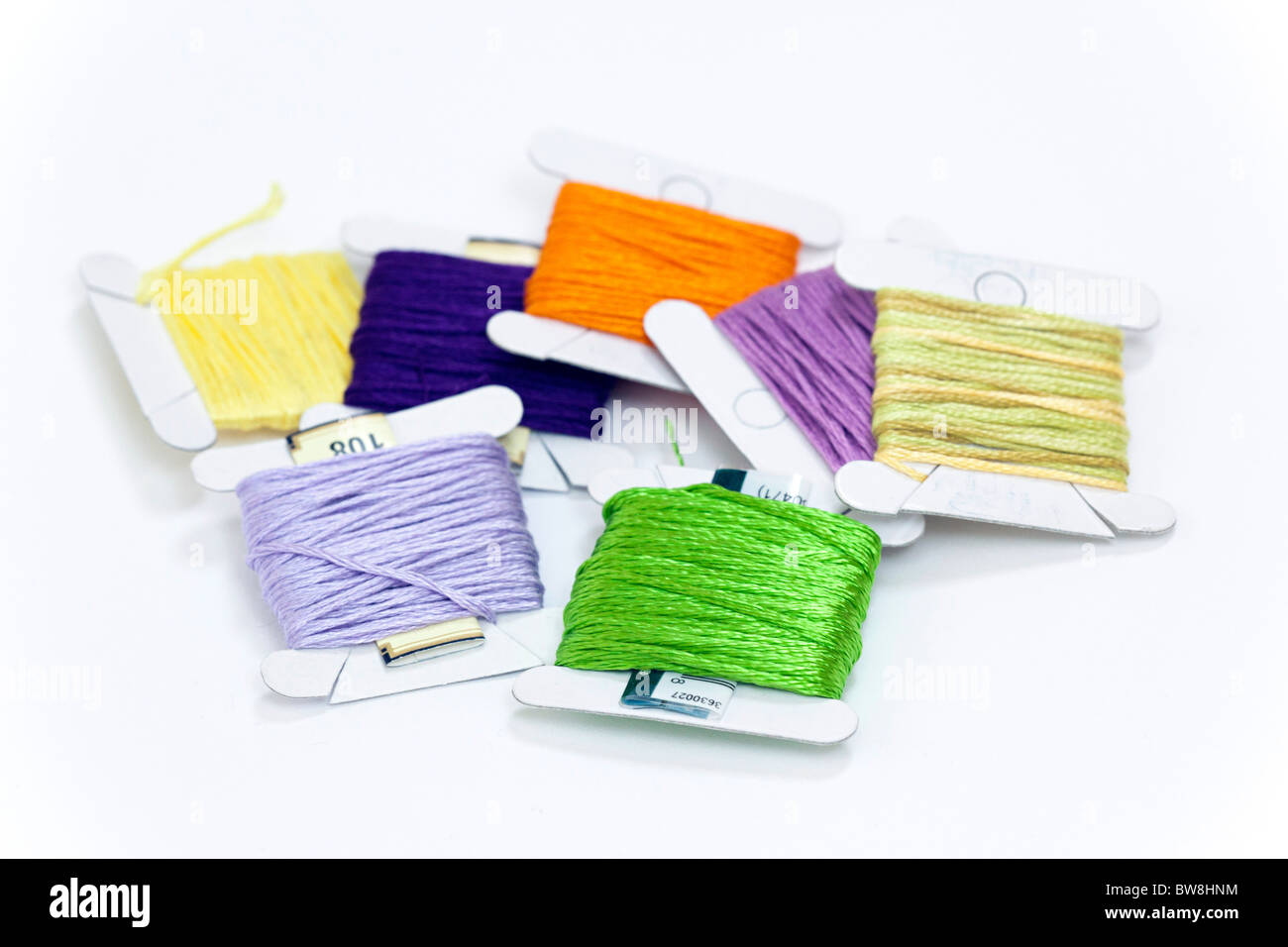 brightly coloured threads Stock Photo - Alamy