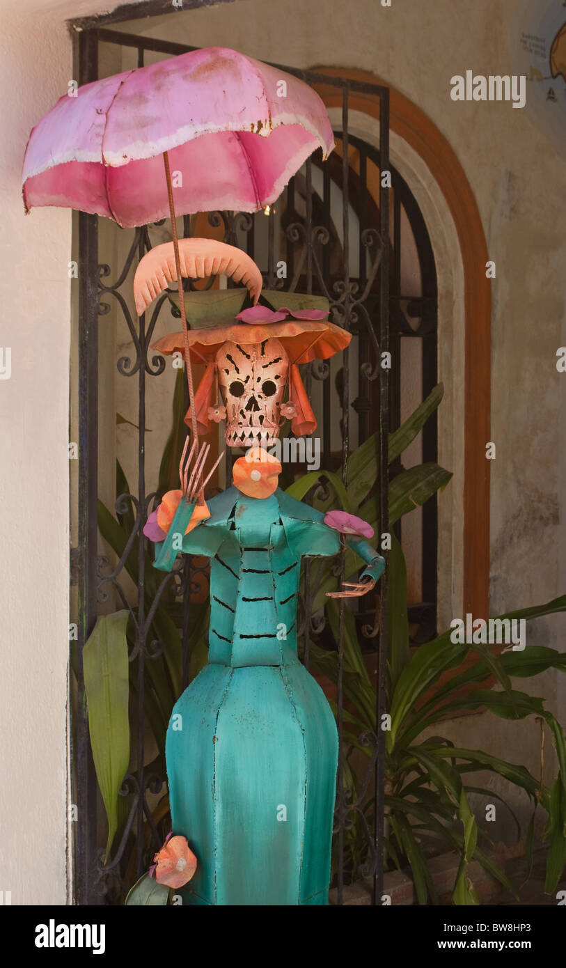 Day of the Dead female skeleton statue or metal sculpture with long ...