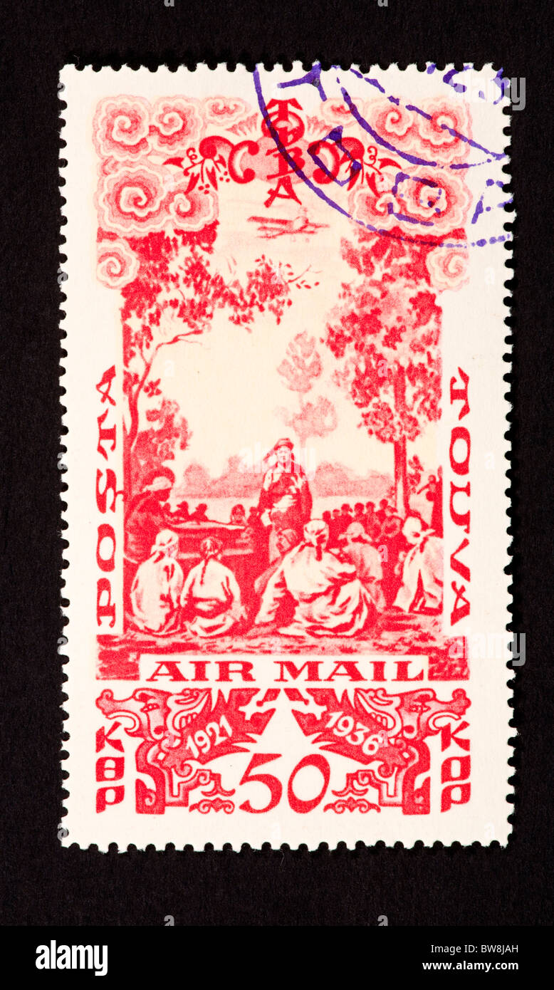 Postage stamp from Tannu Tuva depicting a native gathering Stock Photo ...