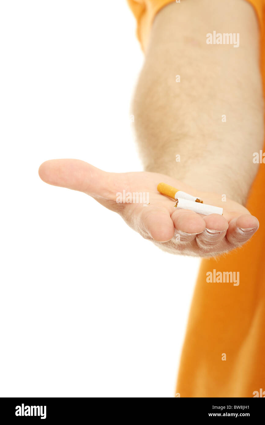 A hand crushing cigarette, isolated Stock Photo - Alamy