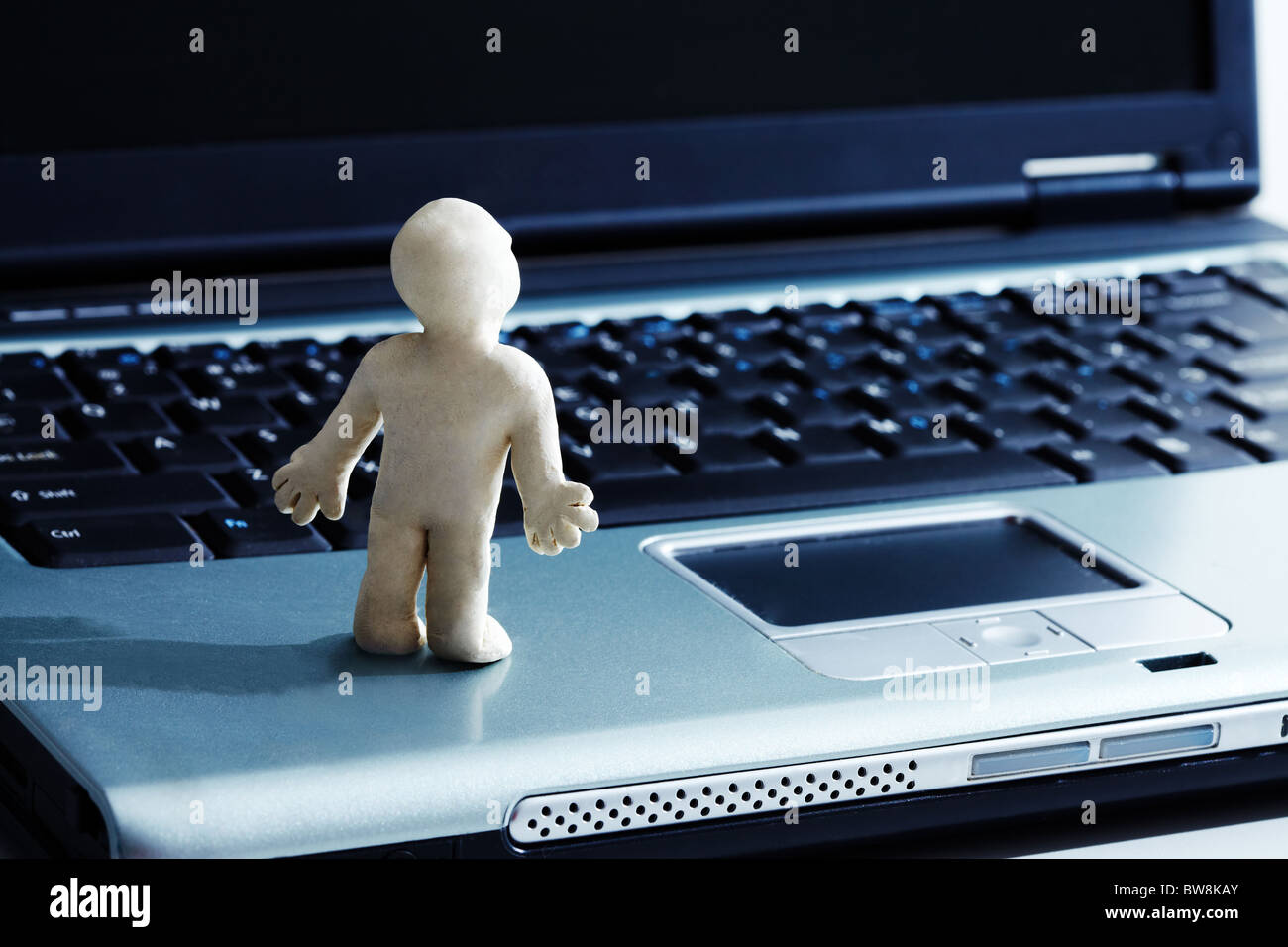 Image of plasticine white man over laptop Stock Photo - Alamy