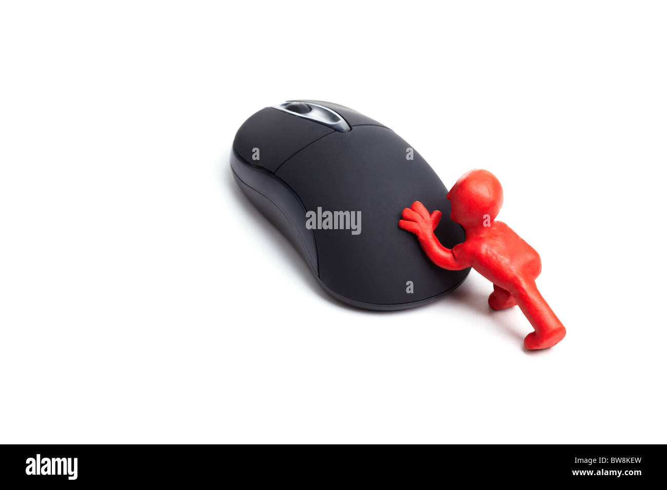 Photo of plasticine red man pushing computer mouse Stock Photo - Alamy