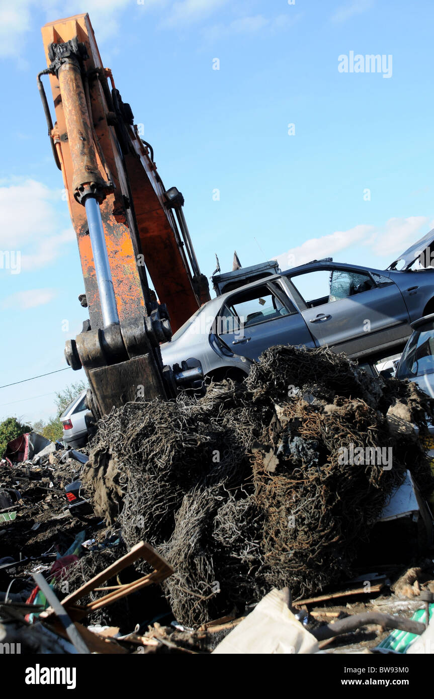 Mechanical crane, scrap metal and cars Stock Photo - Alamy